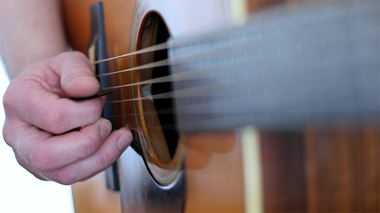 Guitar 101: How to Hold a Pick and Strumming for Beginners - Brandon ...